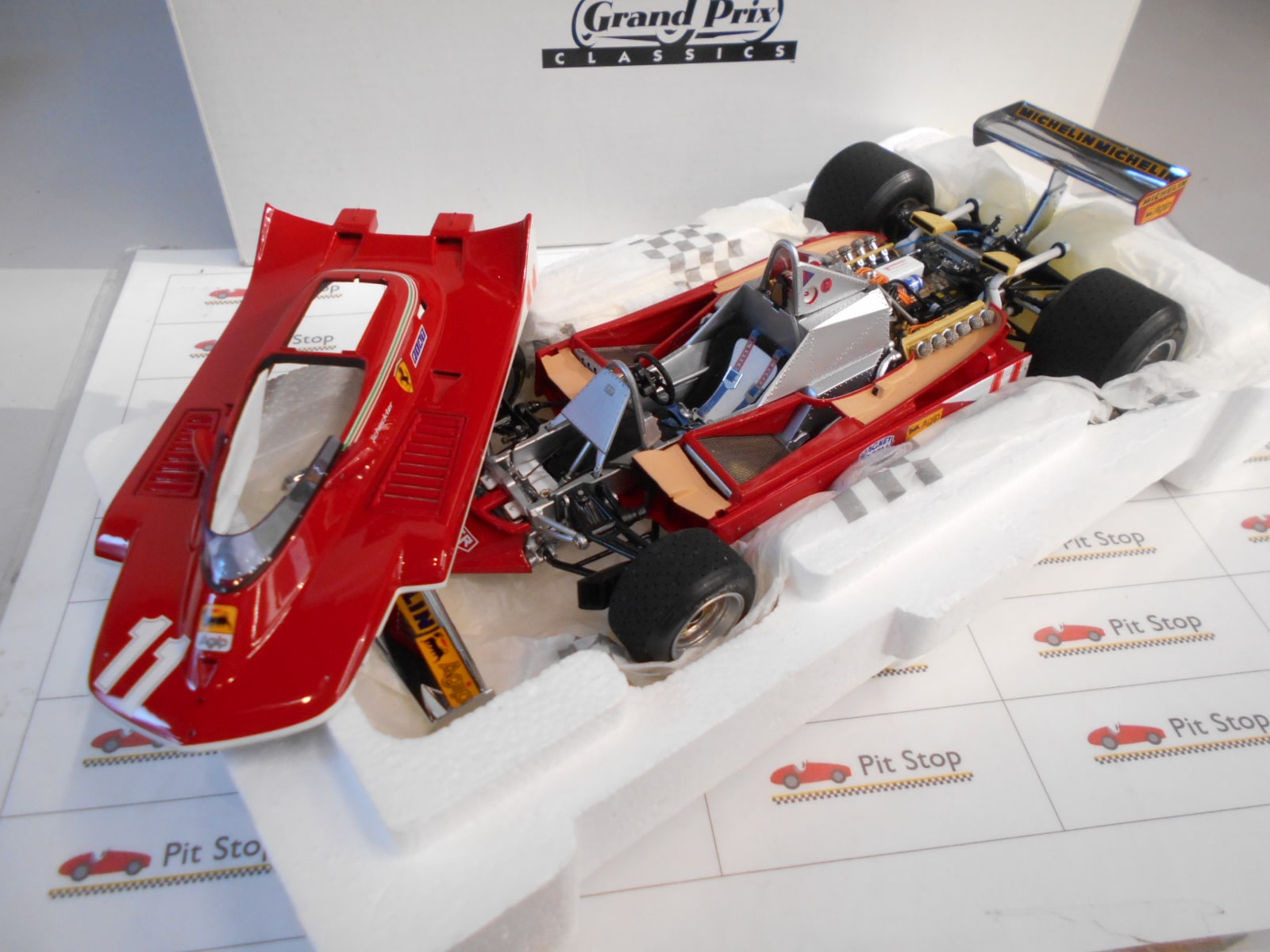 97070 Exoto Ferrari 312 T4 J. Scheckter 1970 1/18, leggera fioritura ...